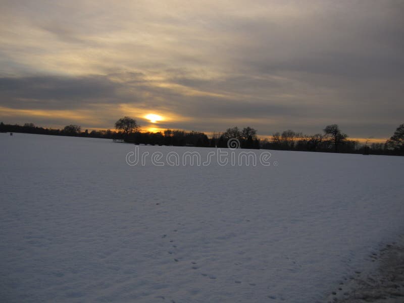 A distant sunset stock photo. Image of dawn, plain, sunrise - 260507236