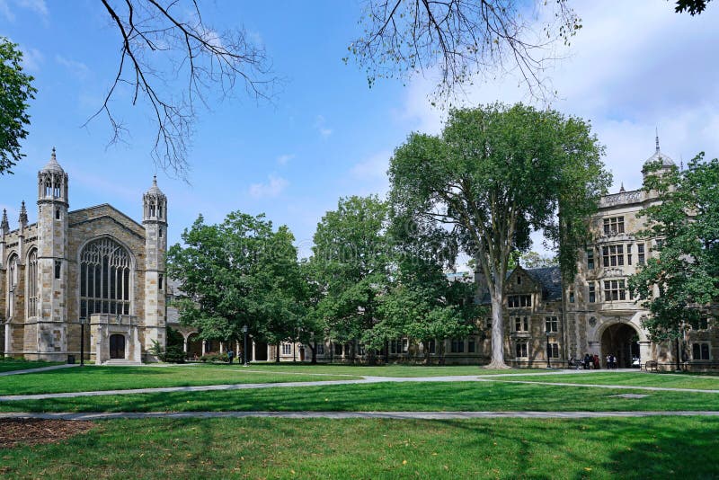 Campus with Lawn and Trees in Front of Gothic Architecture Buildings ...