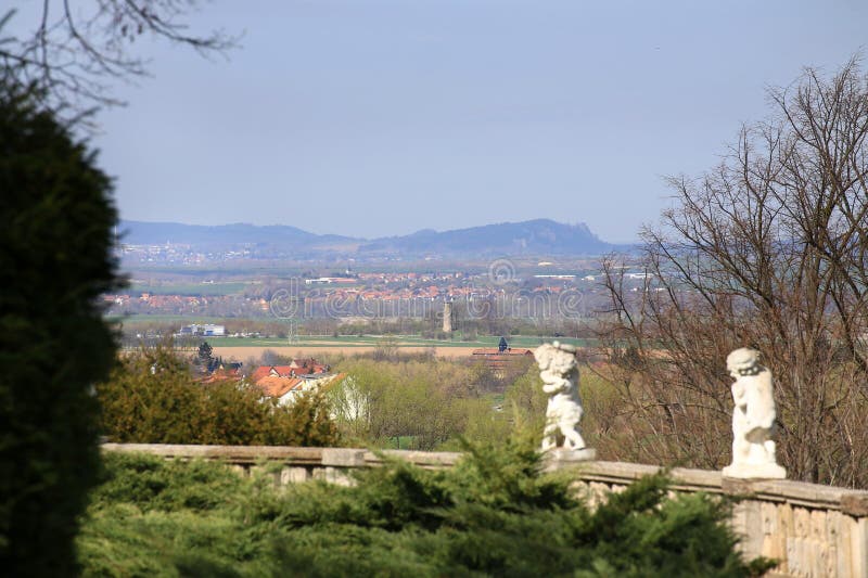 Distant Village View in Germany Framed by Greenery with Hillside ...