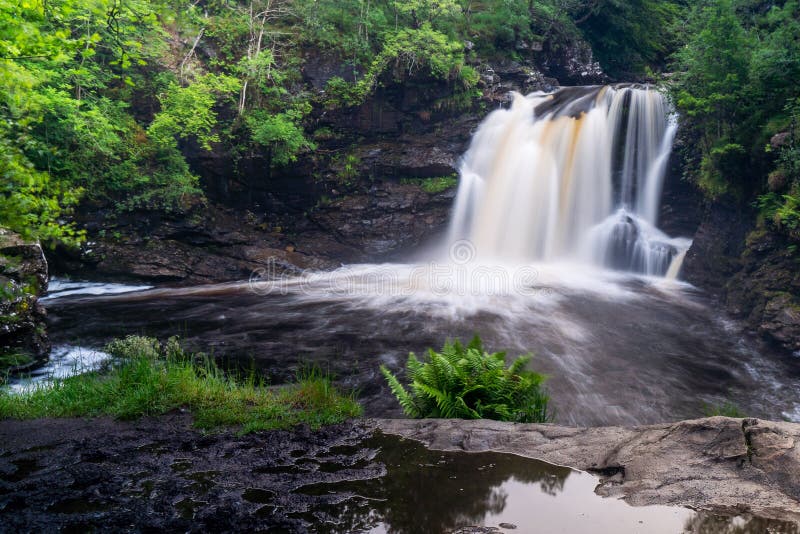 Distant Waterfall stock image. Image of flowing, kingdom - 104324581