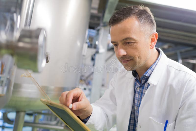 Distillery Scientist Writing Note on Board Stock Image - Image of ...