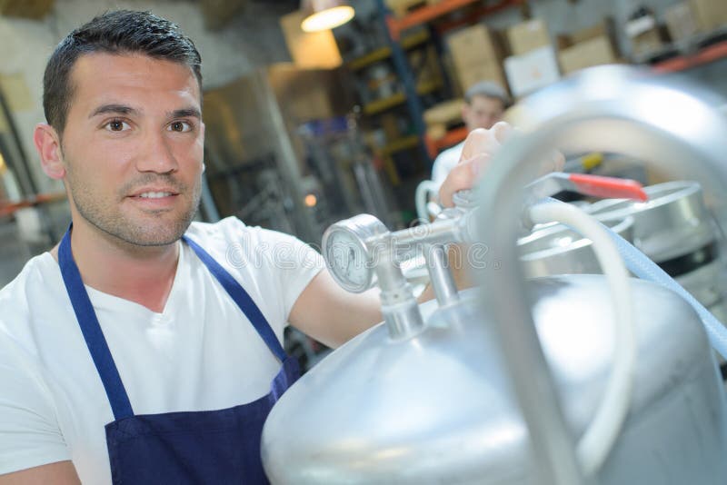 Distillery Worker Posing Next To Pressurize Container Stock Photo ...