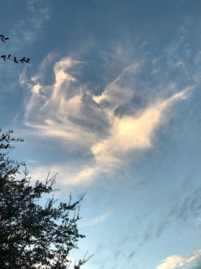 A Distinctive Shape of Clouds in the Sky Stock Photo - Image of clouds ...
