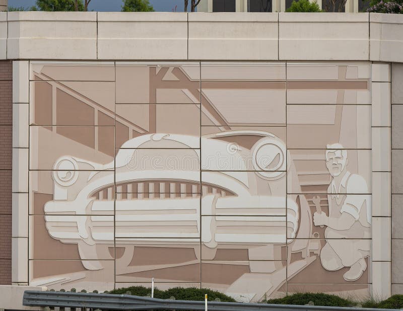 Distinctive Wall Mural Featuring a Car Mechanic Along Interstate 30 in ...