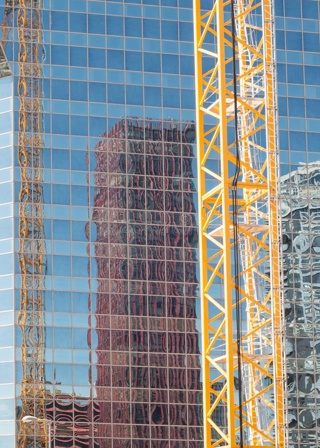 A Distorted Reflection of a Building in the Glazed Facade of Another ...