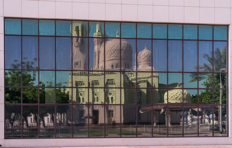 Reflection of the Jumeirah Mosque in Dubai in the Windows of an Office ...