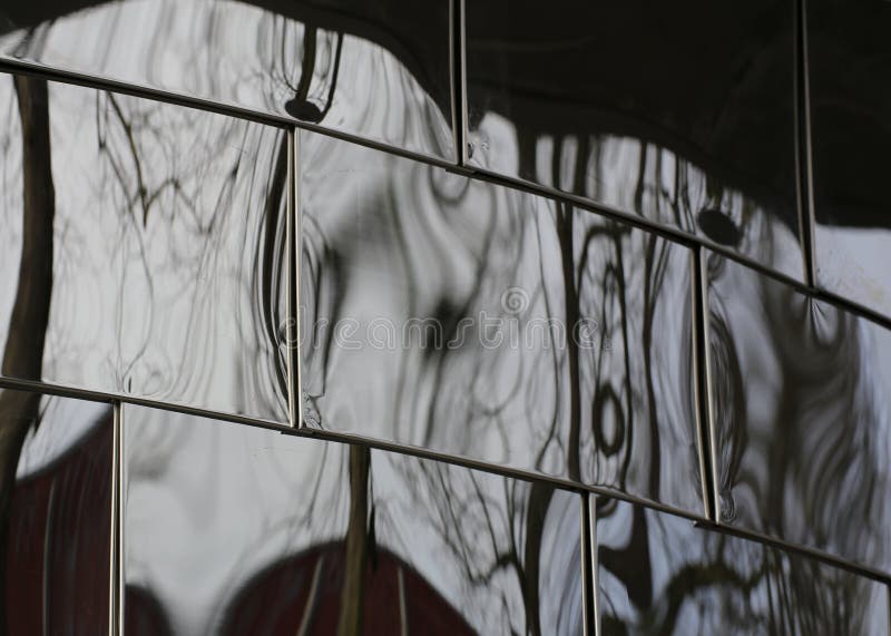 Distorted Reflections in the Windows of an Abandoned Grocery Store ...