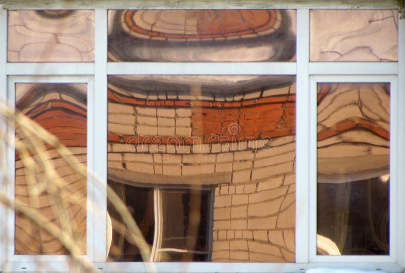Distorted Image of a Brick Wall in the Window of a Neighboring House ...