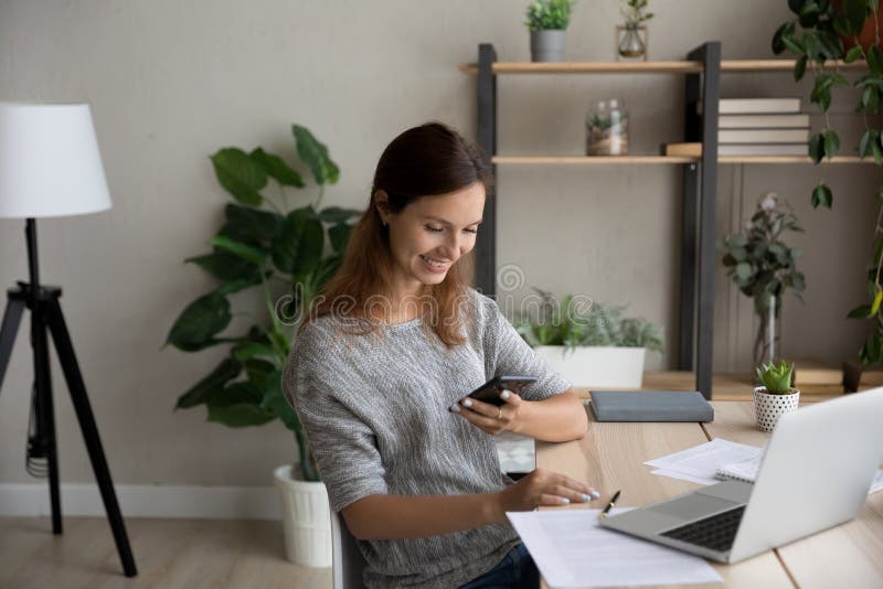 Distracted from Online Computer Work Young Woman Using Smartphone ...