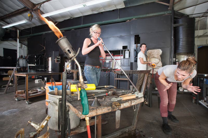 Distracted Glass Workers stock image. Image of kiln, laughing - 30051233