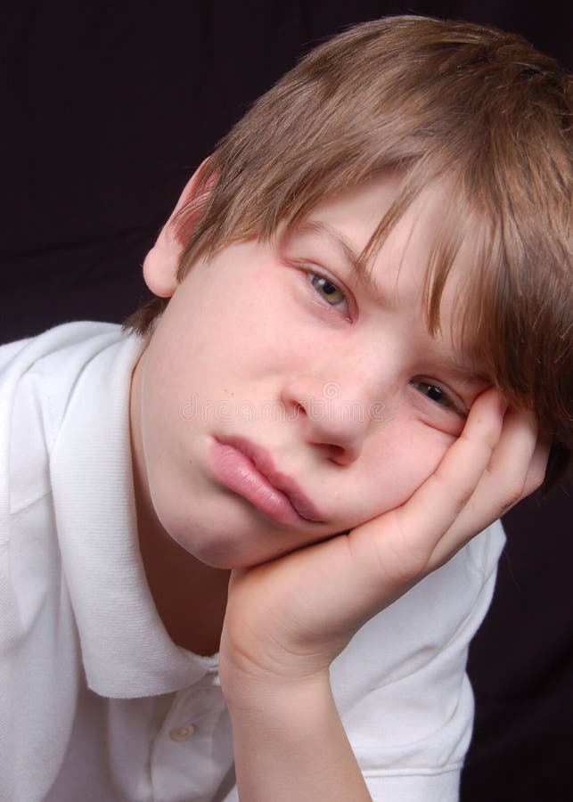 Ornary boy with smirk stock photo. Image of expression - 4197770