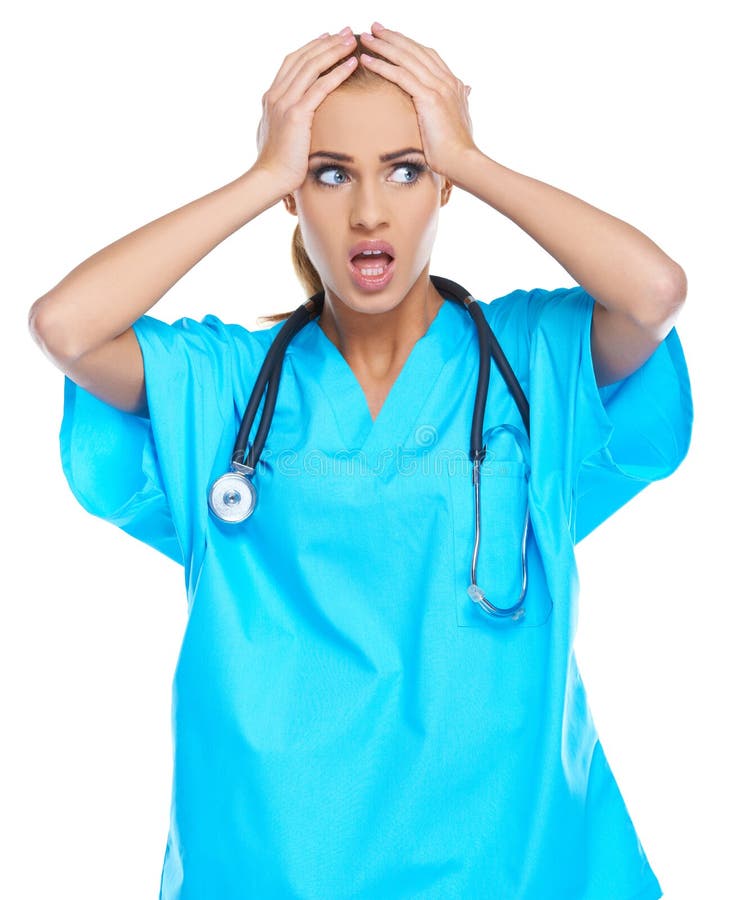 Distressed Doctor Holding Her Head Stock Photo - Image of scrubs ...