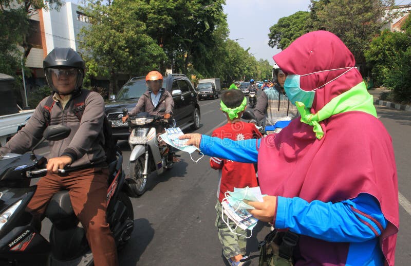 Distribute masks editorial image. Image of indonesia - 46162615