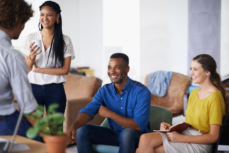 Distributing Work Tasks. a Group of Colleagues in a Meeting. Stock ...