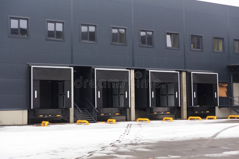 A Distribution Warehouse with Cargo Doors Stock Photo - Image of garage ...