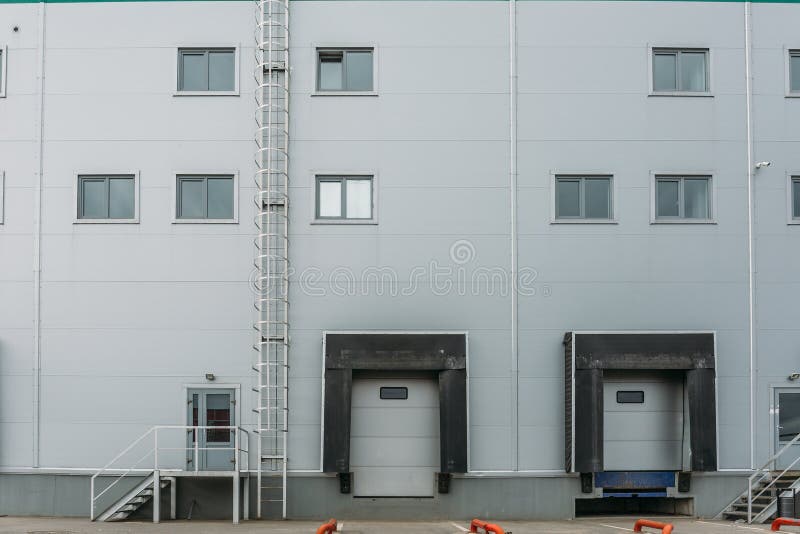 Distribution Warehouse and Logistics Building Exterior with Gates, Copy ...