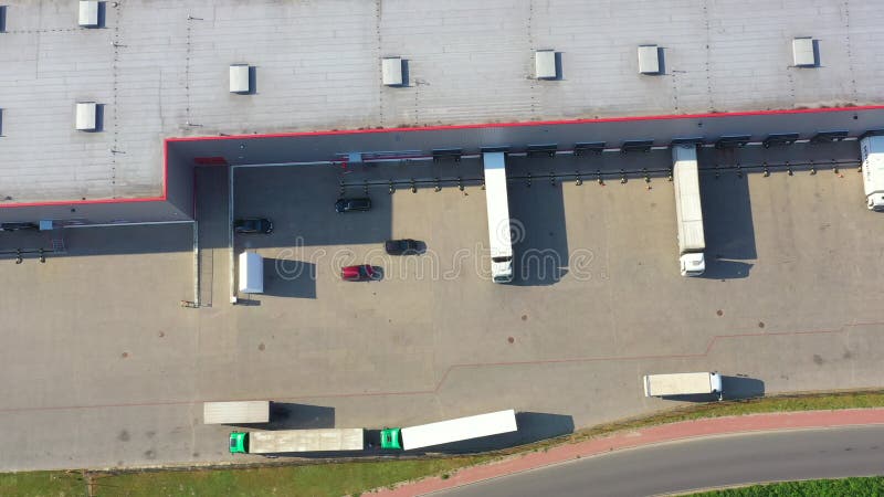 Distribution Warehouse with Trucks of Different Capacity. Aerial View ...