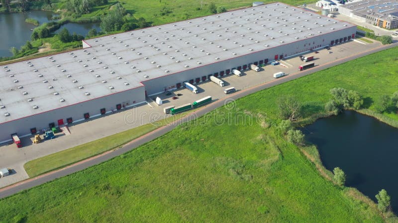 Distribution Warehouse with Trucks of Different Capacity. Aerial View ...