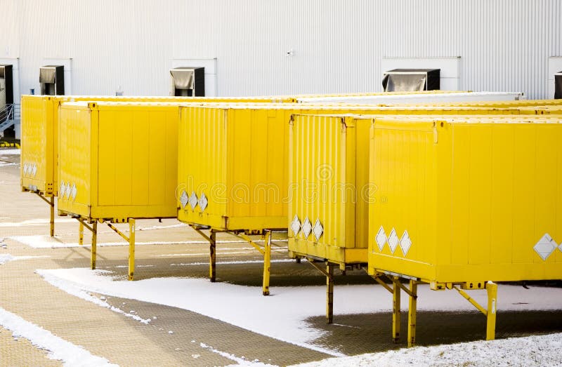 Distribution Warehouse with Yellow Shipping Containers Stock Photo ...