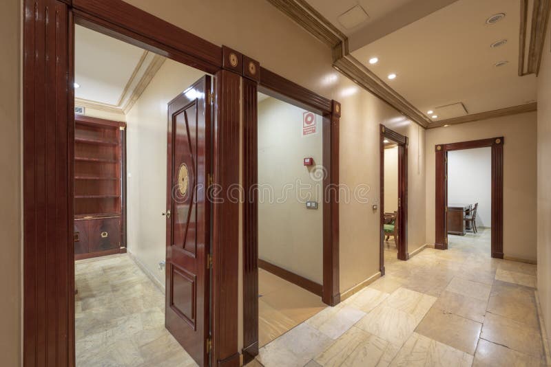 Distributor of an Office with Reddish Wood Doors Stock Photo - Image of ...