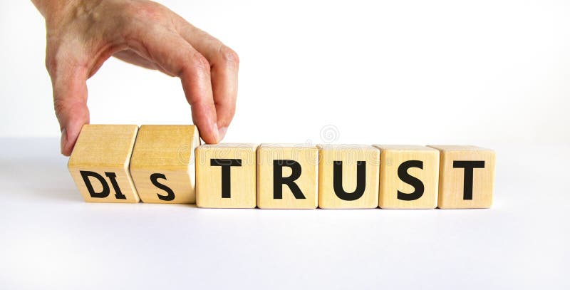 Distrust or Trust Symbol. Businessman Turns Wooden Cubes, Changes Words ...