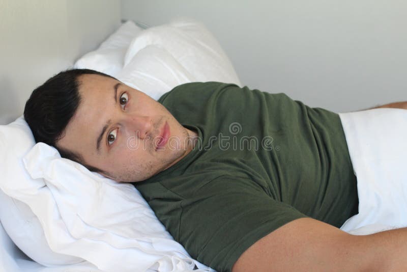Disturbed Looking Man in Bed Stock Photo - Image of concerns, anxiety ...