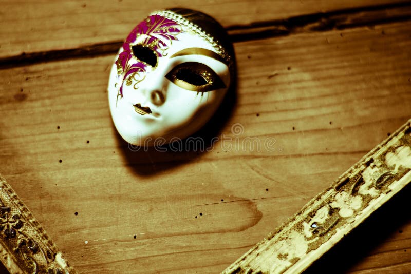 A Beautiful Ancient Mask in an Old Time Frame Stock Photo - Image of ...
