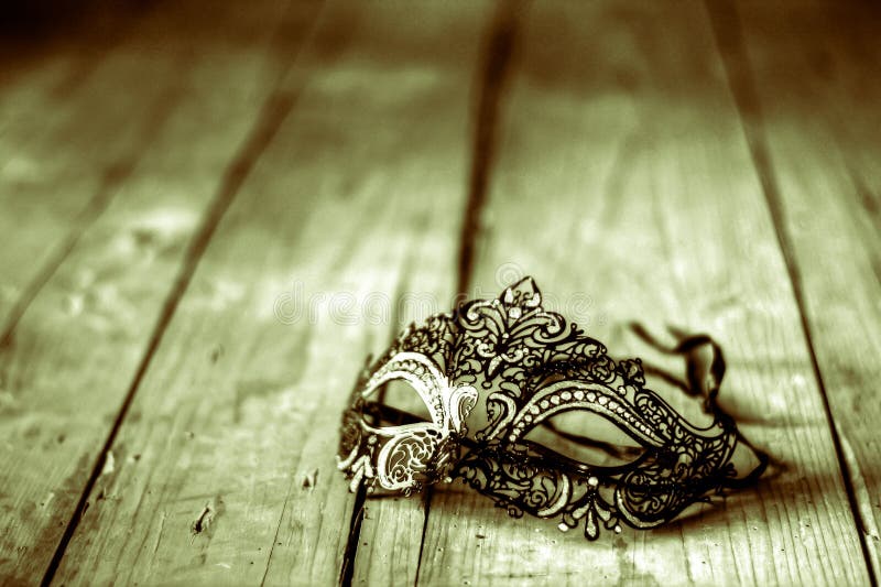 An Elegant Mask on a Wooden Table Stock Image - Image of clown, actor ...