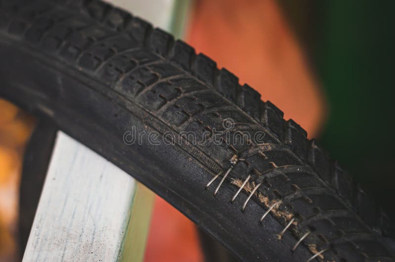 A Ditched Bicycle Tire after an Explosion Stock Image - Image of ...