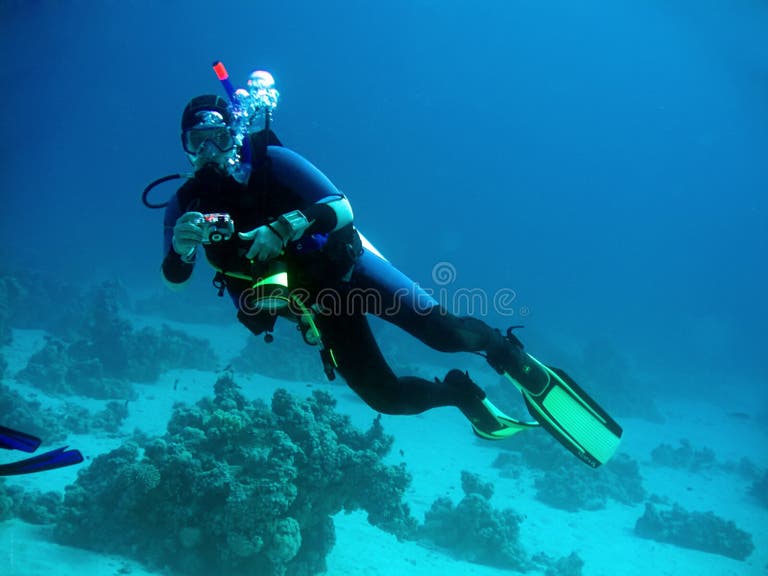 Diver with camera in deep stock image. Image of exotic - 2812267