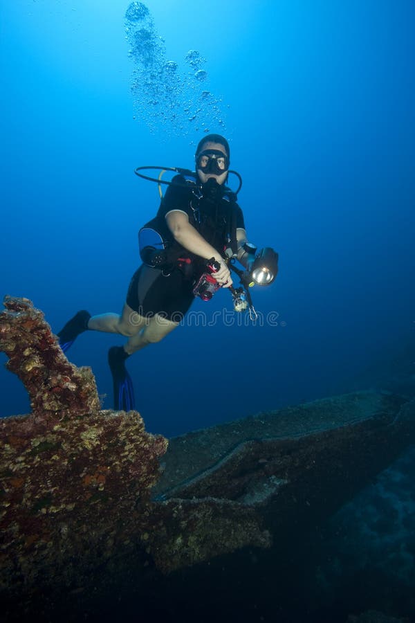 Diver in deep water stock photo. Image of reef, explore - 12176832