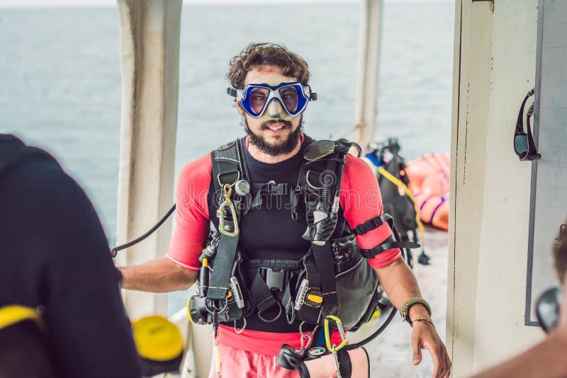 Diver Preparing To Dive into the Sea Stock Image - Image of activity ...