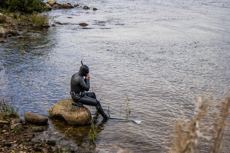 Diver preparing to dive stock photo. Image of adventure - 90883416