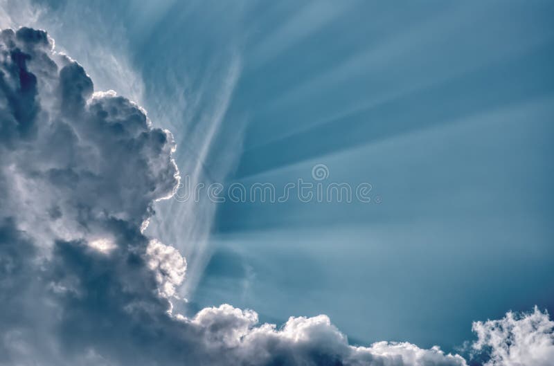 Diverging Rays of the Sun through the Clouds in the Sky during the Day ...