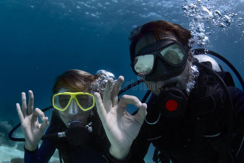 Divers stock photo. Image of scuba, face, contact, beneath - 45692436