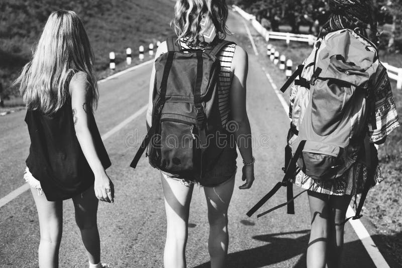 Diverse Backpacker Women Walking Along the Street Side Stock Image ...