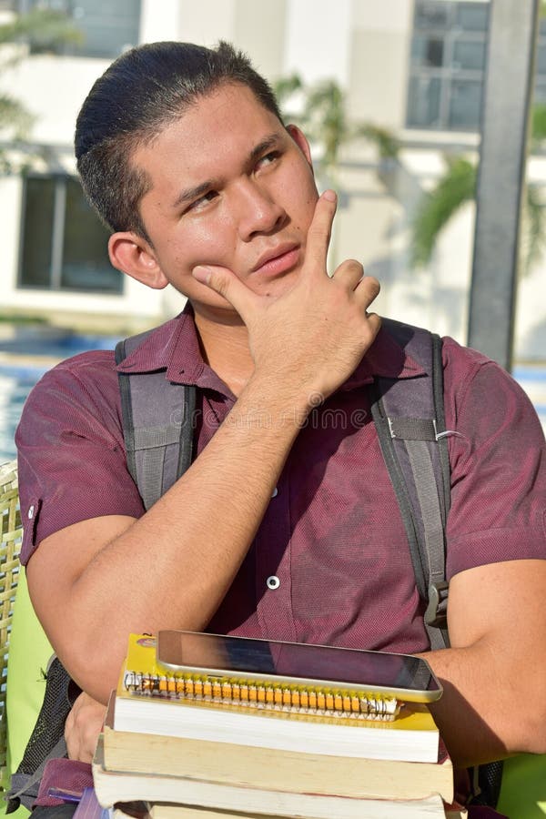 Diverse Boy Student Thinking with Books Stock Photo - Image of diverse ...