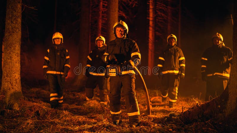 Diverse Brigade of Five Professional Firefighters Posing and Looking at ...