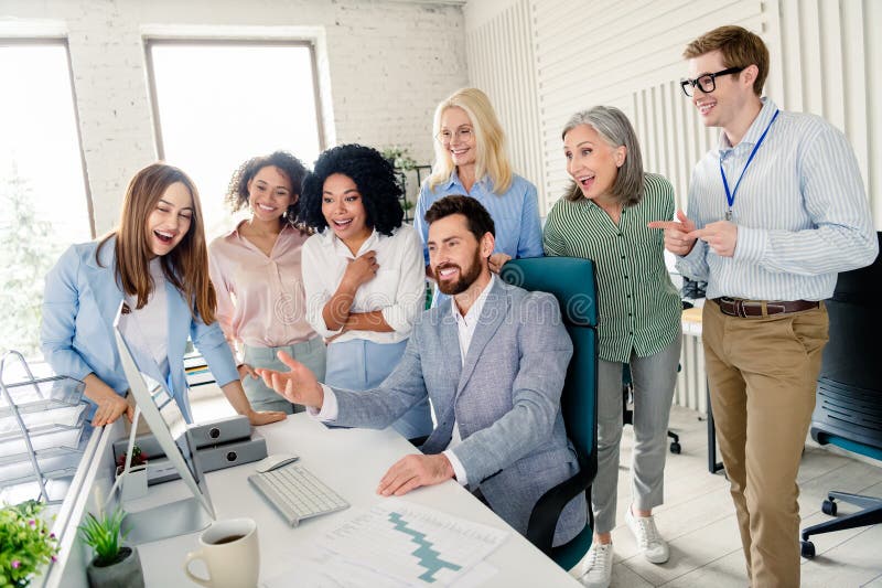 Diverse Business Team Collaborating on a Project in a Modern Office ...