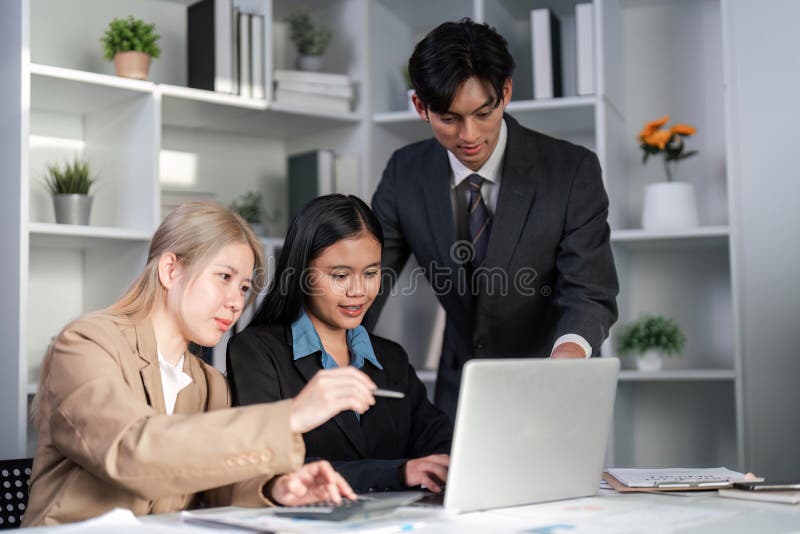 Diverse Business Team Collaborating on Project Plans in Modern Office Setting Stock Image ...