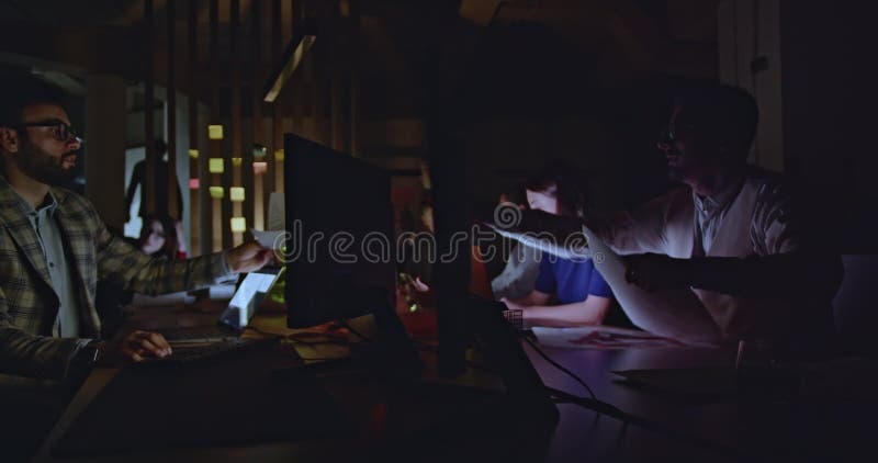 Diverse Business Team Working Late in Office on Project, Multicultural ...