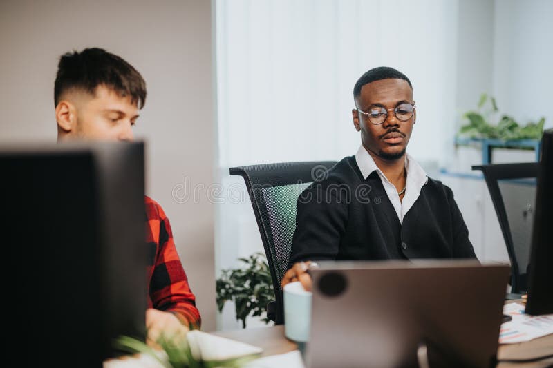 Diverse Business Team Working at Office Desks, Analyzing Documents and ...
