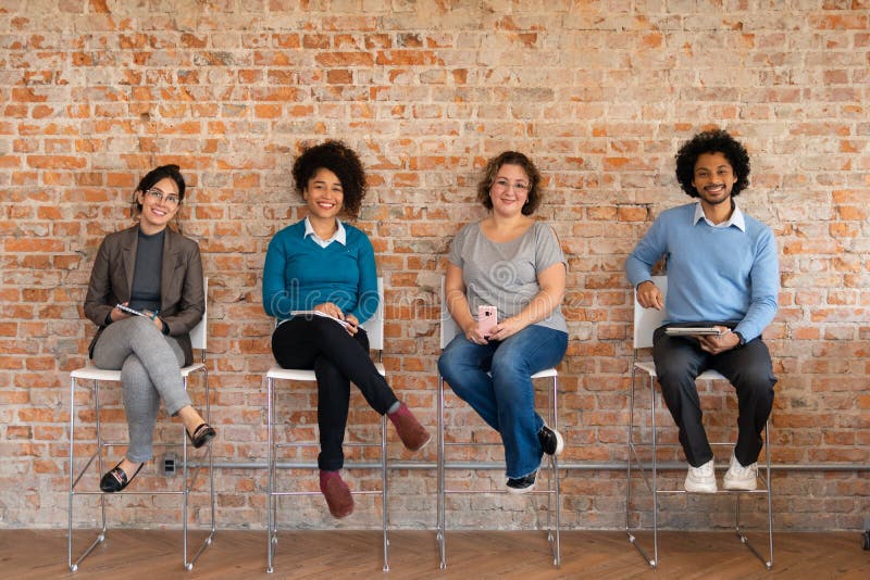 Workgroup Smiling and Looking at Camera Stock Image - Image of positive ...