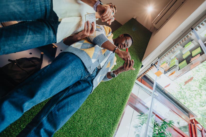 Diverse Colleagues Brainstorm and Collaborate, Sharing Ideas on Sticky ...