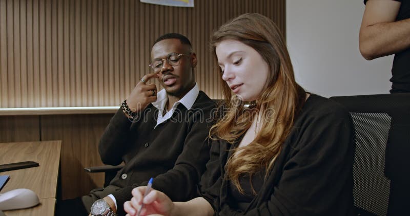 Diverse Colleagues Having a Conversation in a Modern Office Setting ...