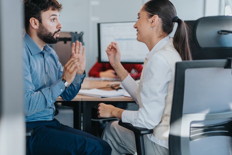 Diverse Colleagues in a Lively Discussion at the Office, Showcasing ...