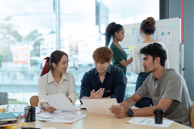 Diverse Colleagues Working on Project Together. Diverse Team of ...