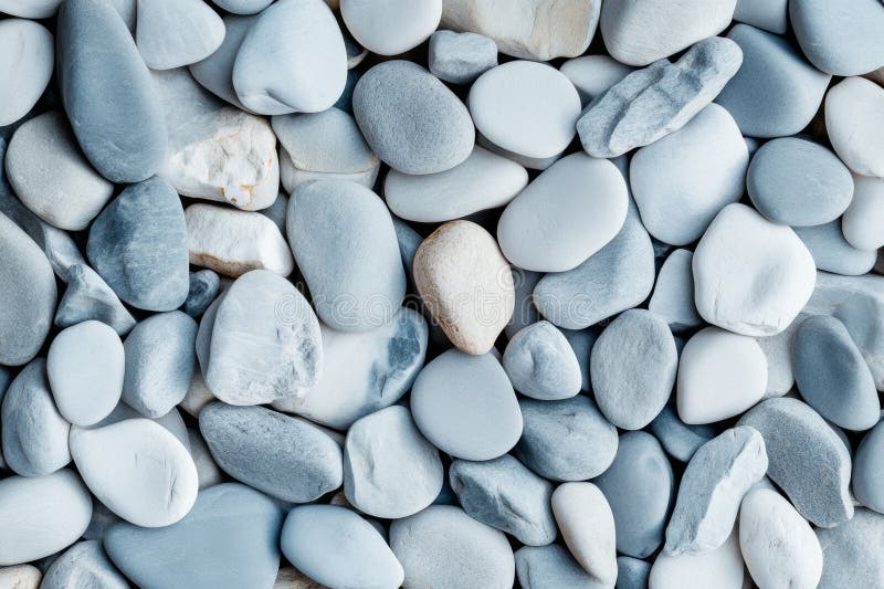 Diverse Collection of Smooth Gray Pebbles Arranged Neatly on a Surface ...