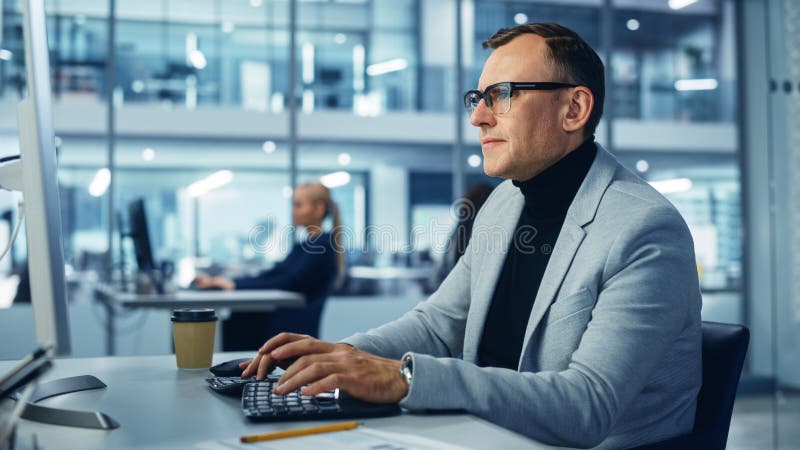 Diverse Corporate Office: Stylish Handsome Big Data Engineer Using ...