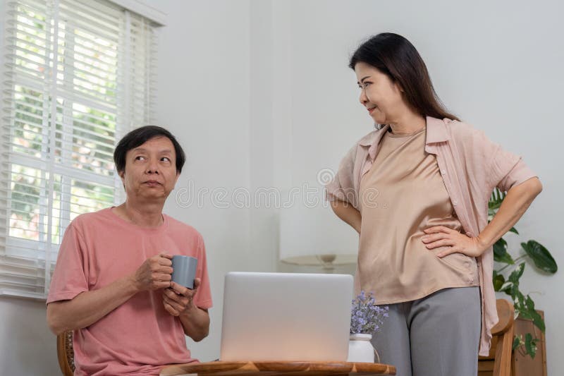 Diverse Couple Interacting Playfully in a Modern Home Office Setting ...